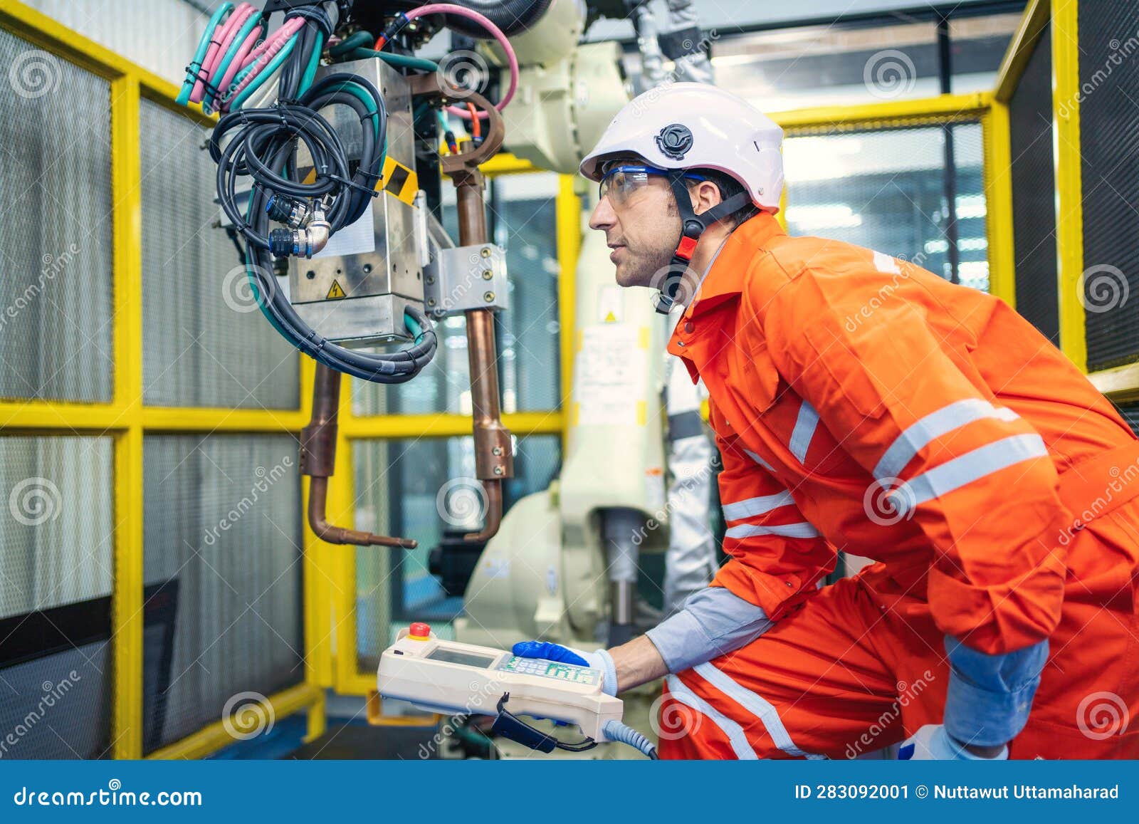 Engineers Team Mechanic Using Computer Controller Robotic Arm for ...