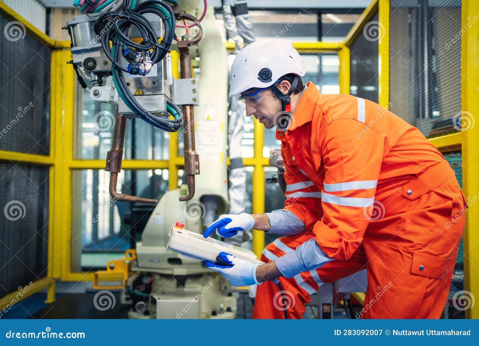 Engineers Team Mechanic Using Computer Controller Robotic Arm for ...