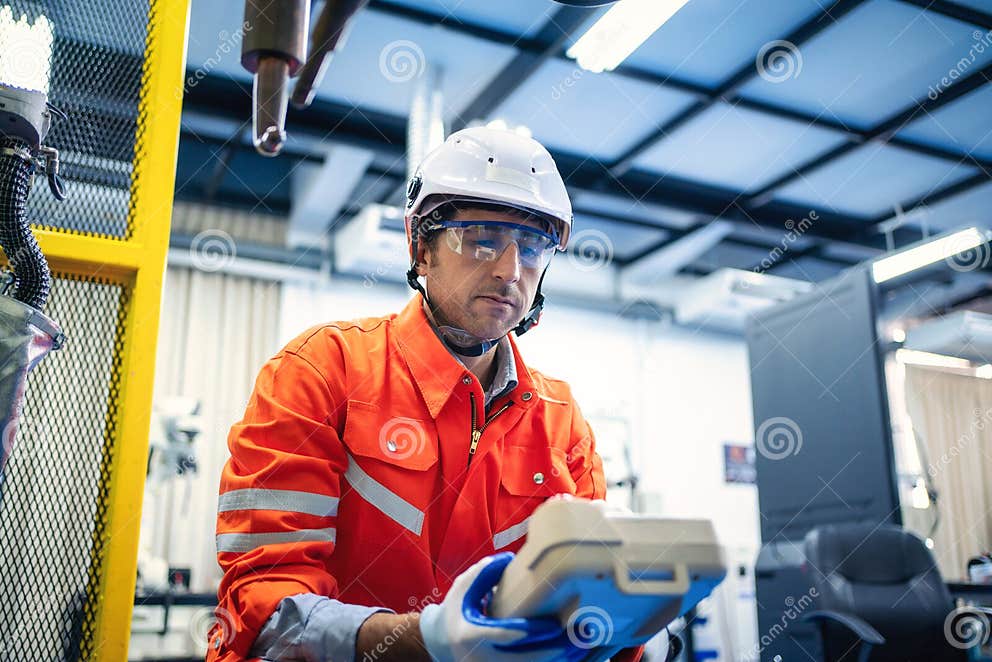 Engineers Team Mechanic Using Computer Controller Robotic Arm for ...