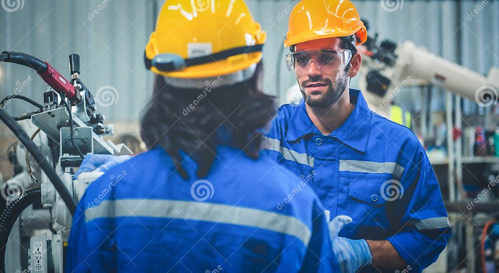 Engineers Team Mechanic Using Computer Controller Robotic Arm for ...