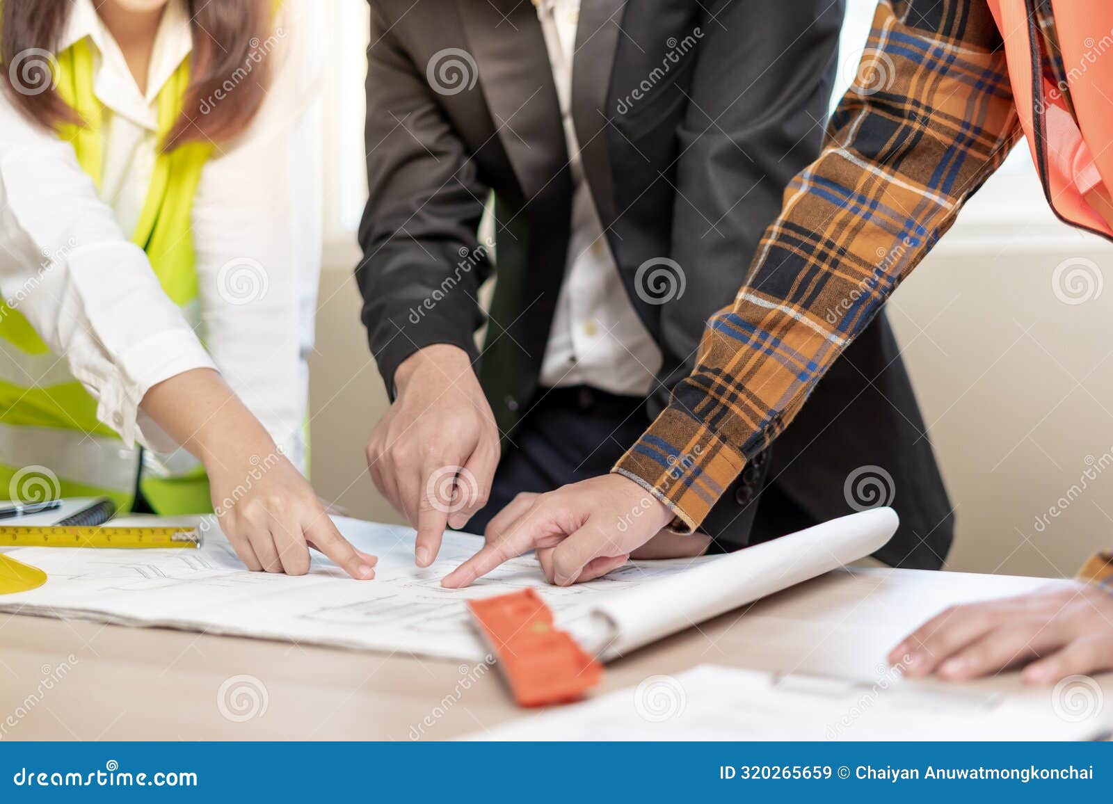 Engineers Team Use Tablet and Check the Blueprint on Site. Contractor ...