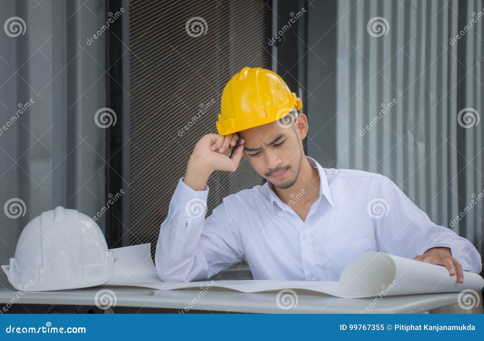 Engineers are Thinking about the Blueprint at the Table. Stock Image ...