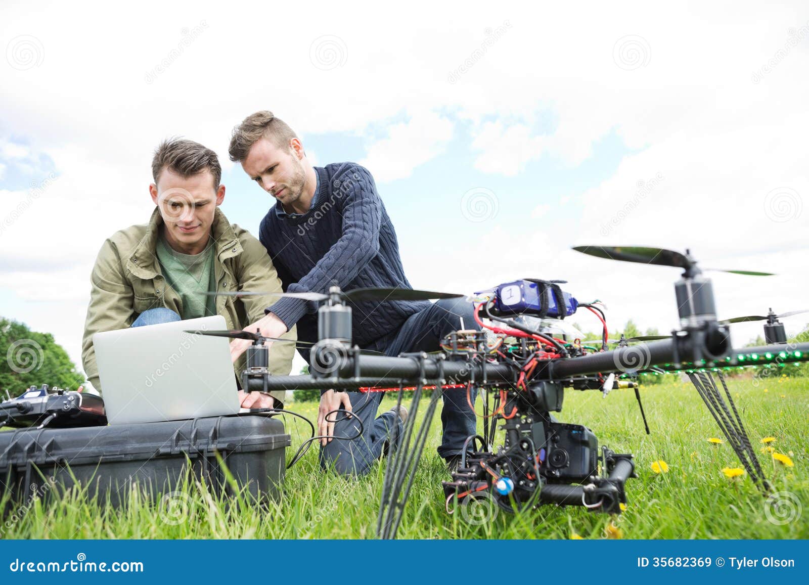 Engineers Using Laptop by UAV Octocopter Stock Image - Image of remote ...