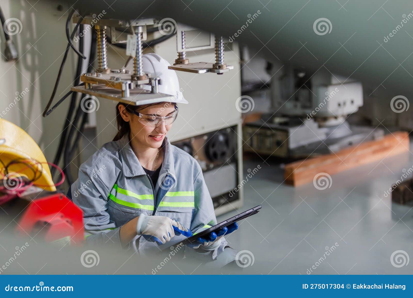 Engineers Woman Use Tablet To Check Condition Robotic Arm. Female ... Engineers Woman Use Tablet To Check Condition Robotic Arm. Female ...