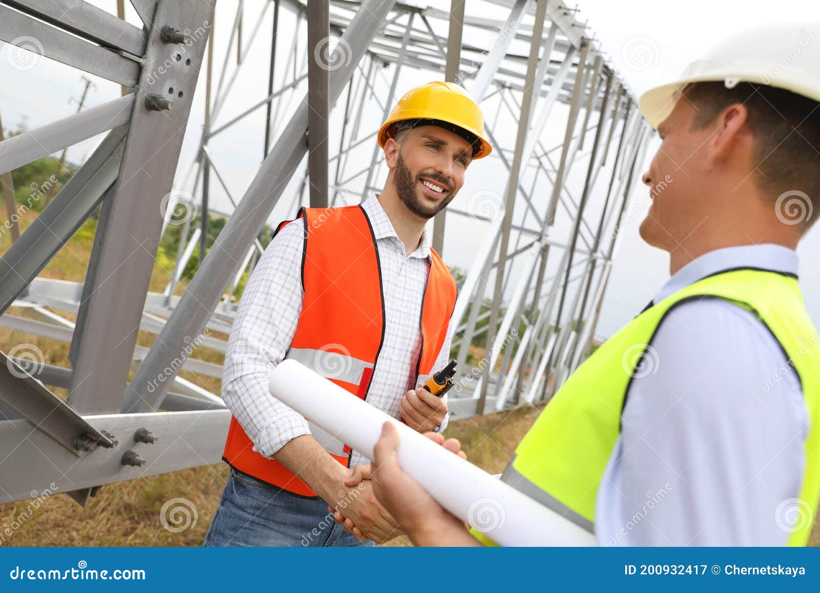 Professional Engineers Working on Installation of Electrical Substation ...