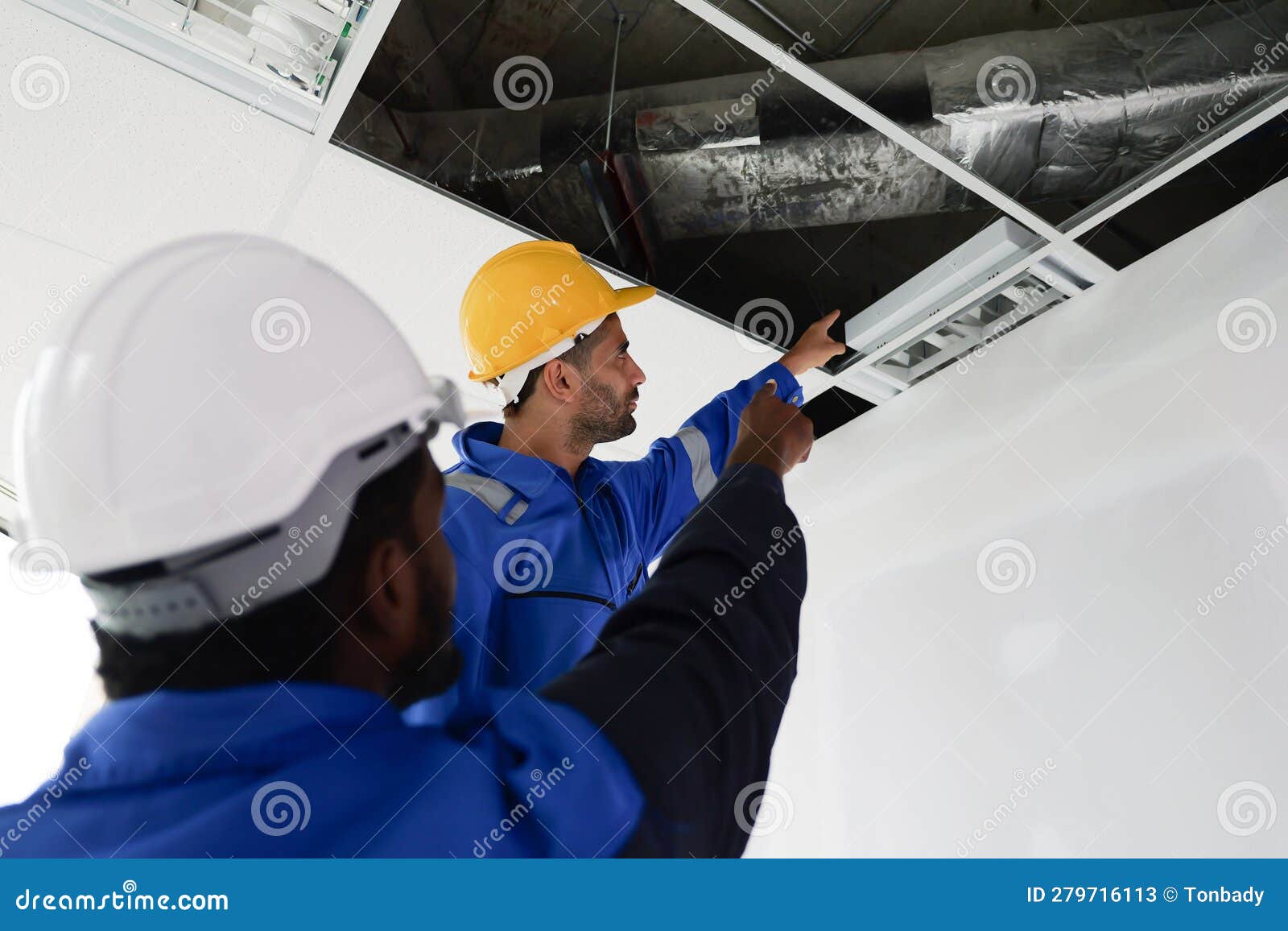 Engineers Working and Installing System at Construction Site Stock ...