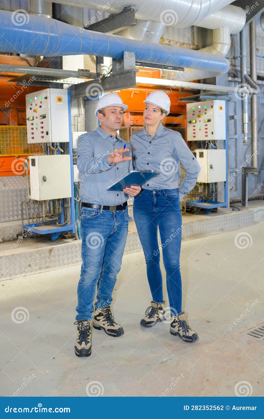 Engineers Working in Temperature Control Room Large Building Stock ...