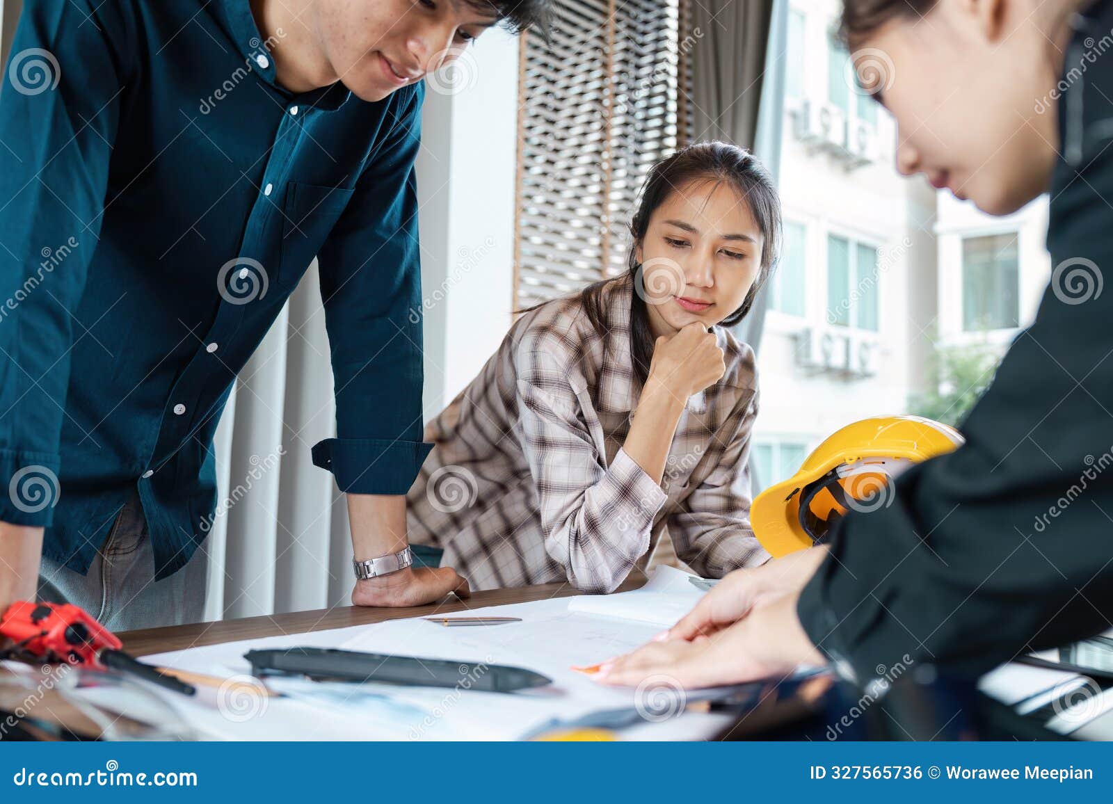 Group of Engineer Collaboration on a Project in a Modern Office Setting ...