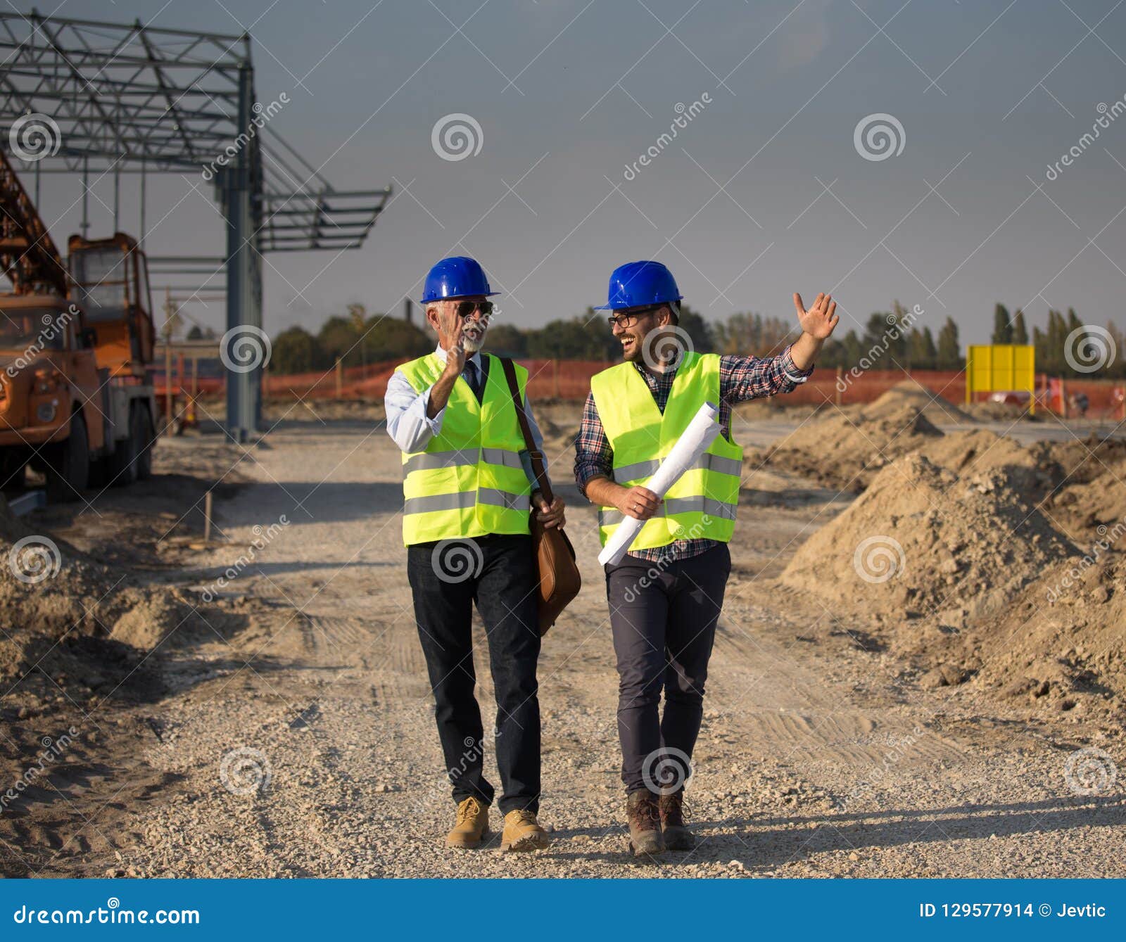 Enginers Talking at Building Site Stock Photo - Image of talking ...