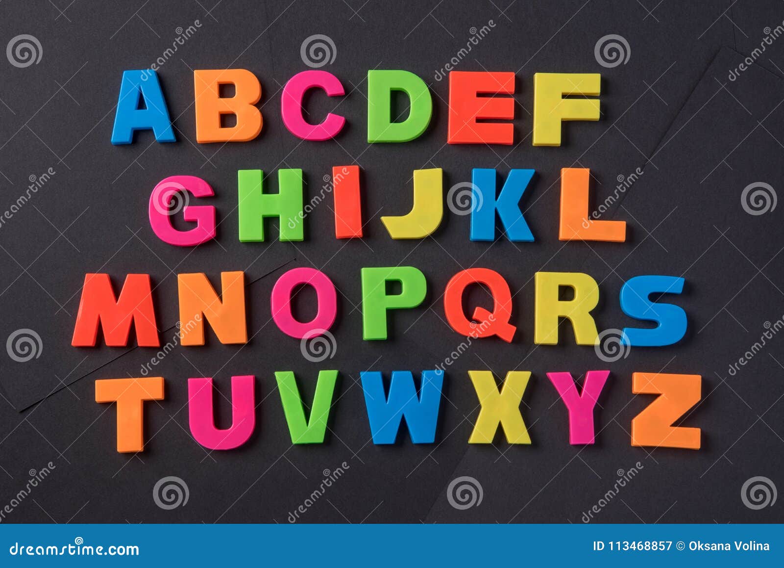 English Alphabet of Letters of Different Colors on a Black Background ...