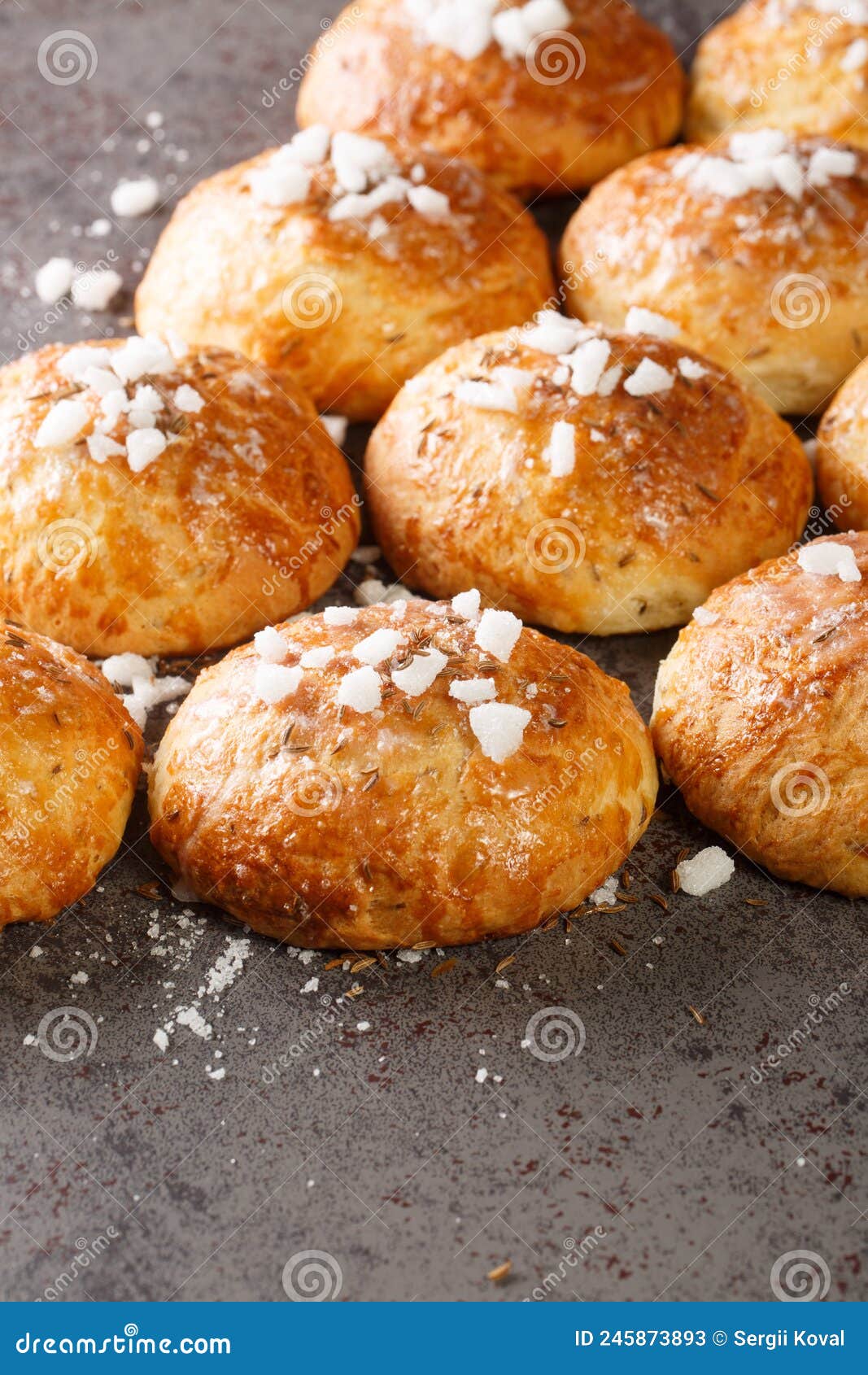 English Bath Buns Roll with Cumin and Sugar Close-up. Vertical Stock ...