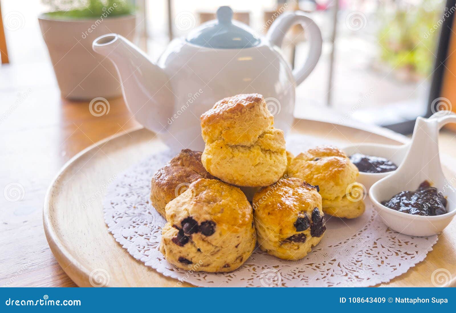 English Breakfast and Tea Break. Scones on Wooden Table with a Cup of ...