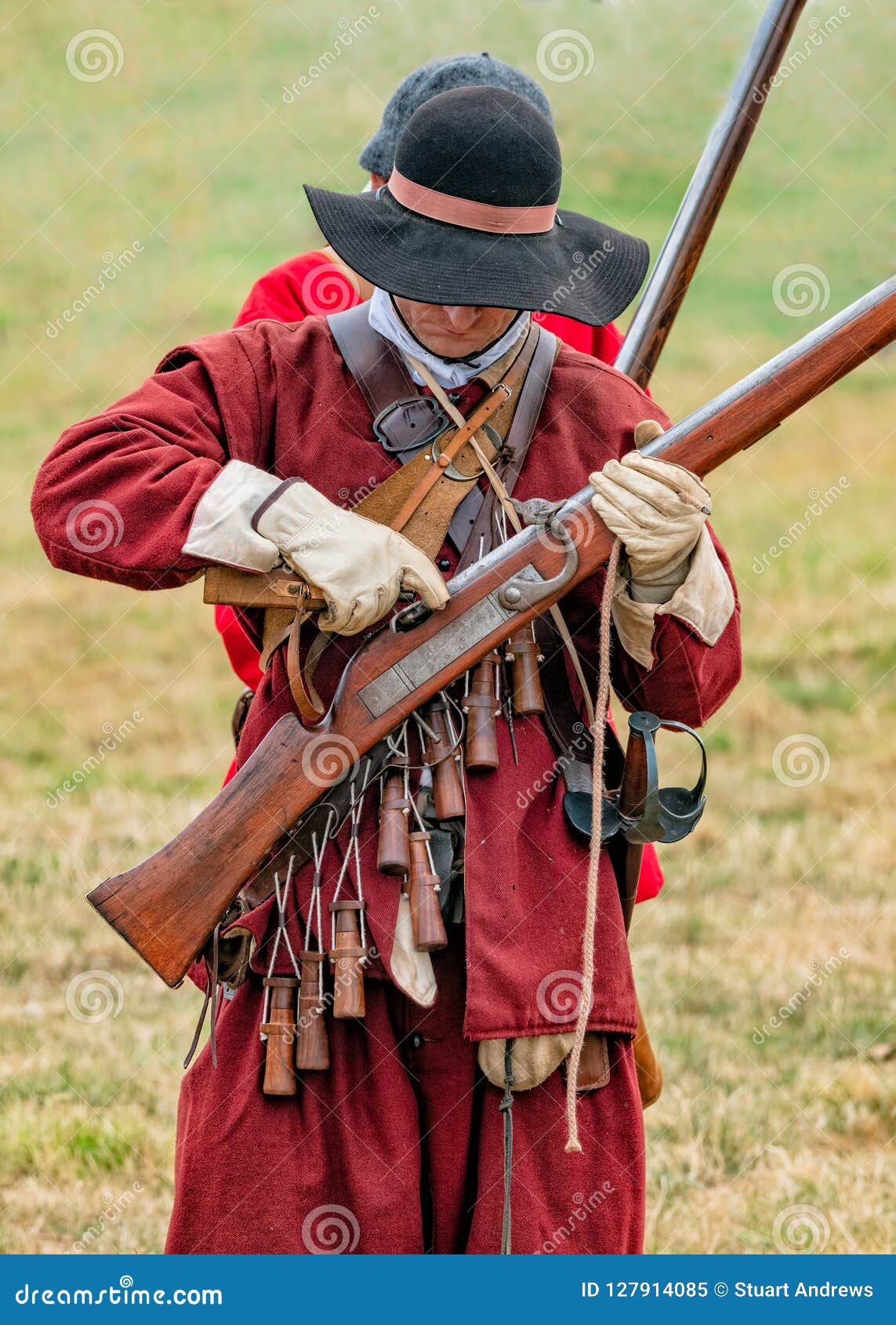 English Civil War Militiaman Priming His Musket. Editorial Image ... English Civil War Militiaman Priming His Musket. Editorial Image ...