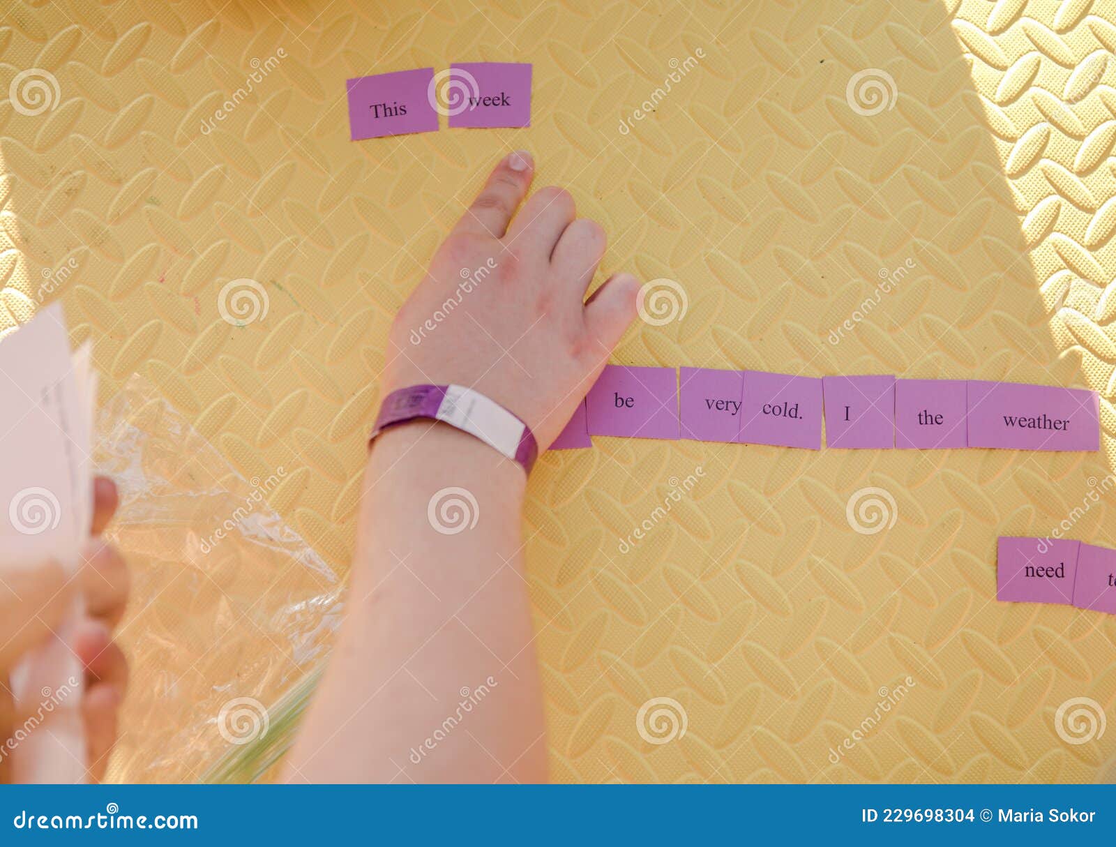 English Lesson. Children Assemble English Words into Sentences Stock ...