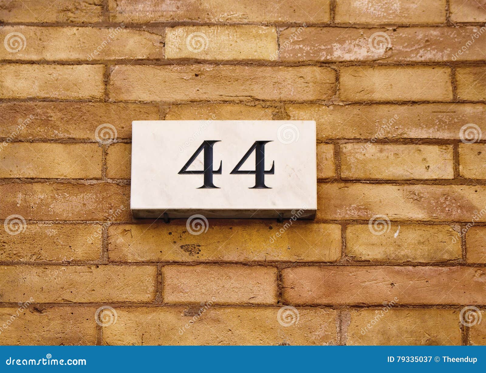 Engraved building number stock image. Image of design - 79335037