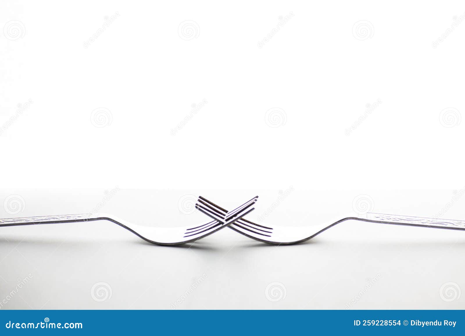 Engraved Silverware Fork Set of Two Placed Face To Face Crossing Their ...