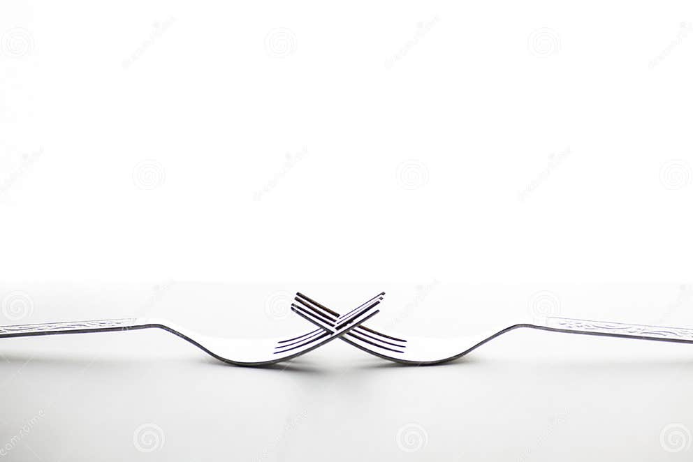 Engraved Silverware Fork Set of Two Placed Face To Face Crossing Their ...