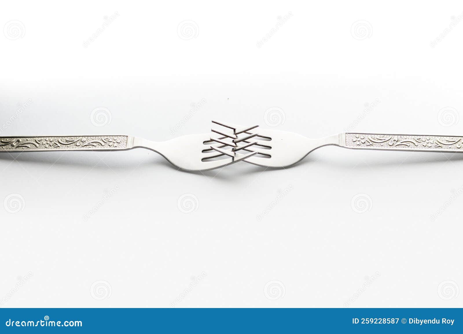 Engraved Silverware Fork Set of Two Placed Face To Face Crossing Their ...