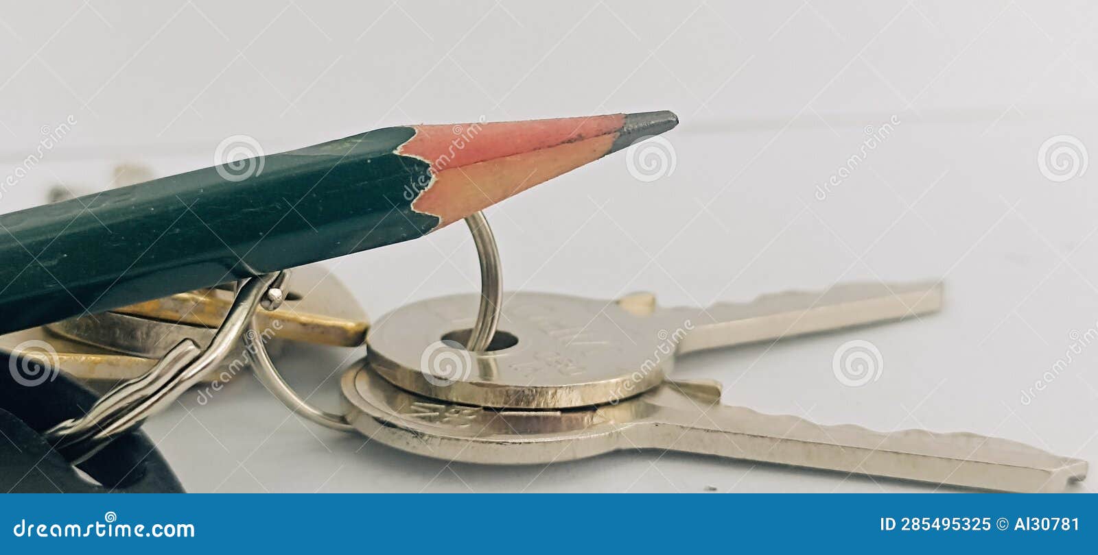 Engraved Wooden Pencil Key Ring on Table Stock Image - Image of ...