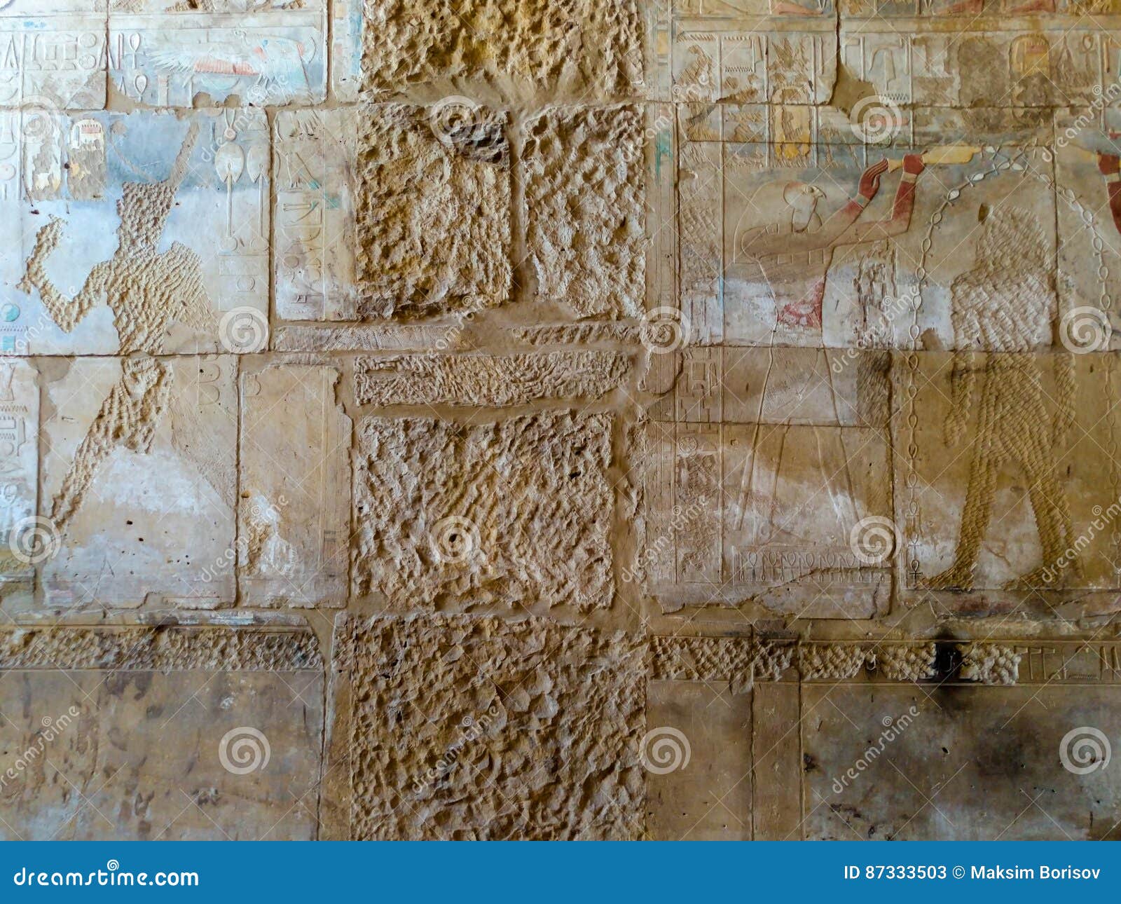 Engravings on the Wall of the Ancient Temple of Egypt. Stock Image ...