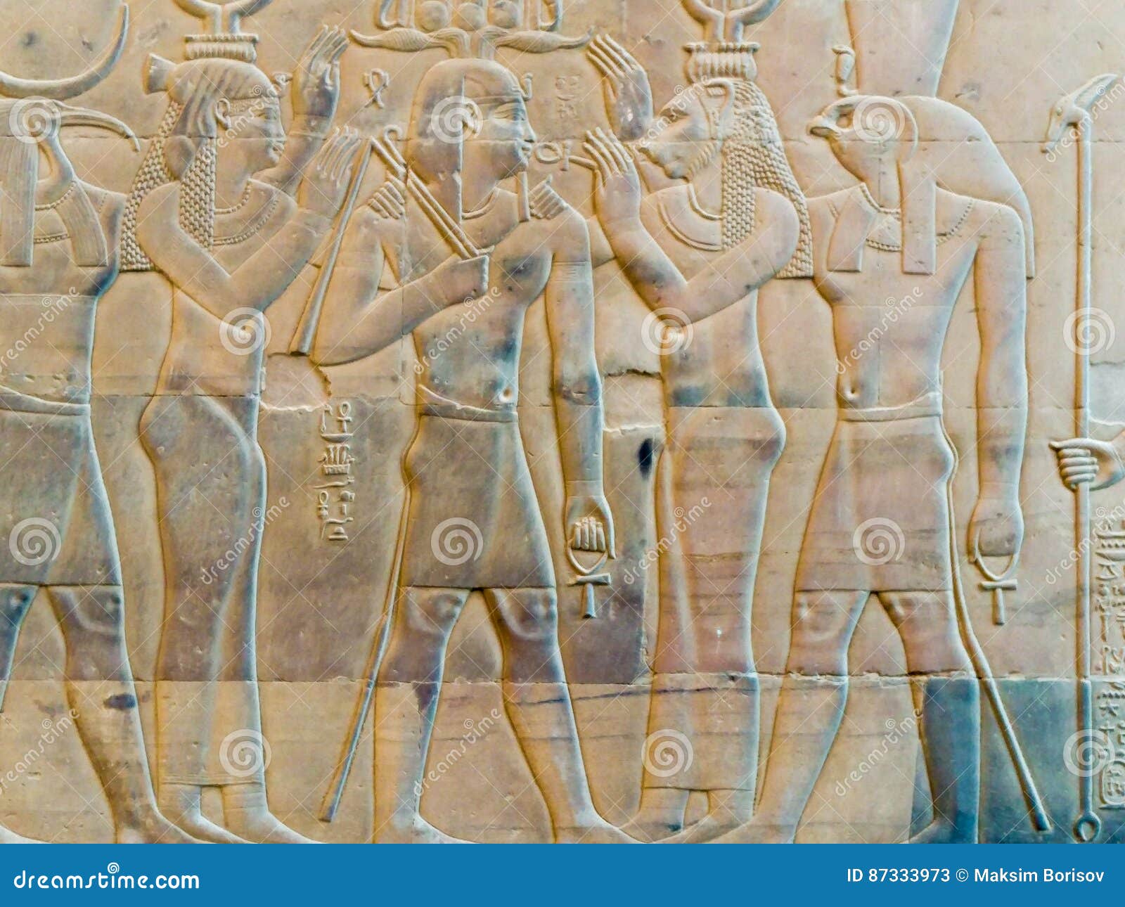 Engravings on the Wall of the Ancient Temple of Egypt. Stock Image ...