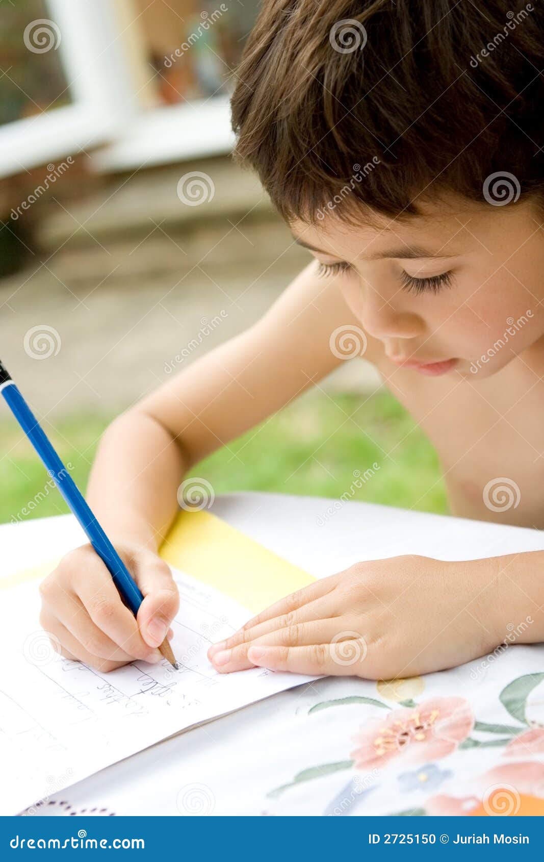 Engrossed in his writing stock photo. Image of caucasian - 2725150