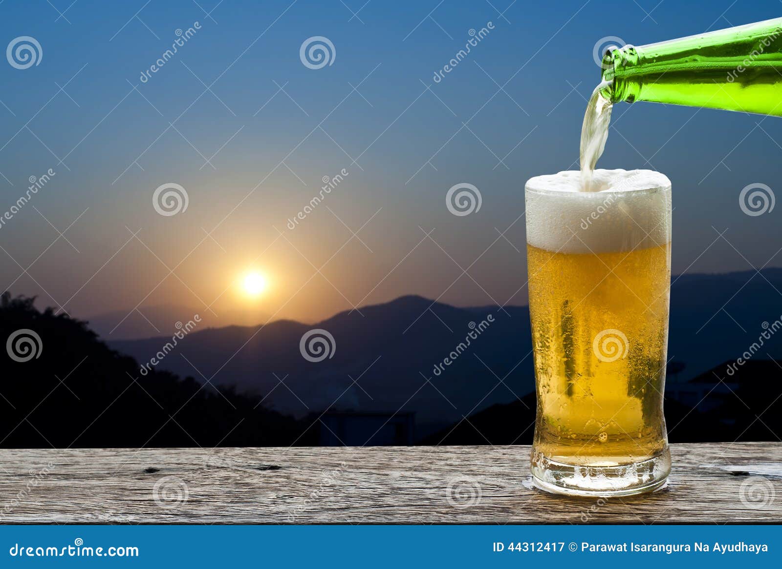 Enjoy beer with sunset. stock image. Image of foam, beverage - 44312417