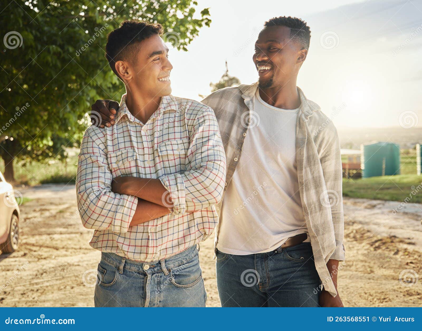 They Enjoy the Field Work. Two Young Farmers Standing Outside. Stock ...