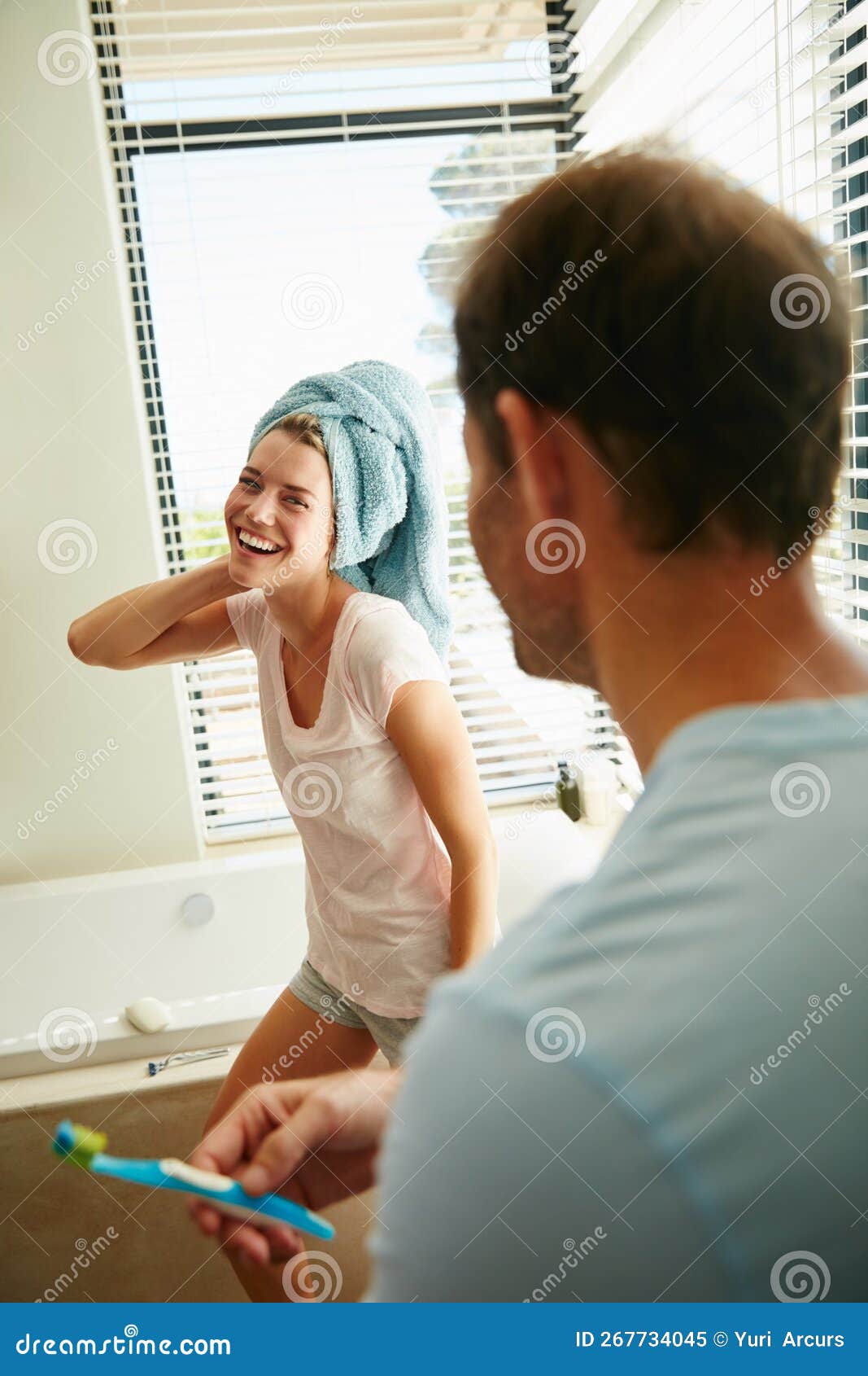 We Enjoy Getting Ready Together. a Young Couple Getting Ready in the ...