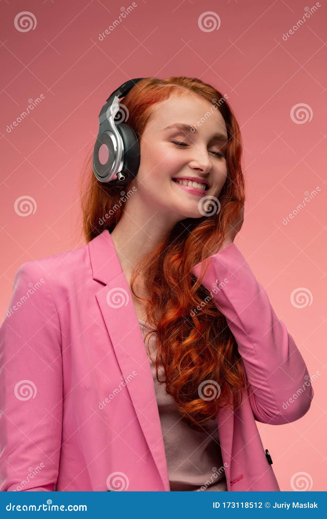 Enjoy Listening To Music Beautiful Young Redhead Woman In Headphones