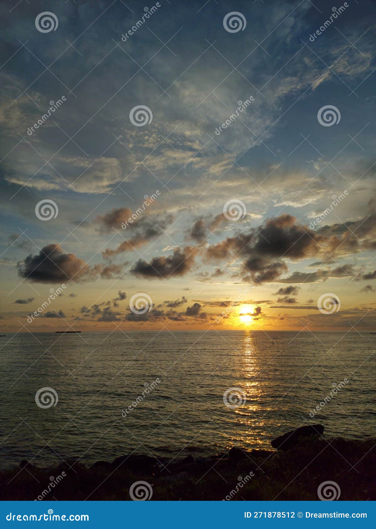 Enjoy the Sunset Sitting and Relaxing on the Beach with a Cool Breeze ...