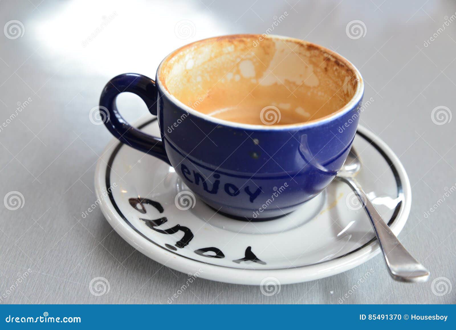 Enjoy (reflection of Word Enjoy Shown on Cup) Stock Photo - Image of ...