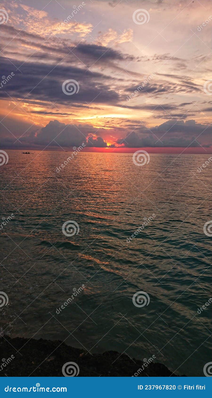 Enjoyed the Sunset Which is a Little Covered in Clouds Stock Photo ...