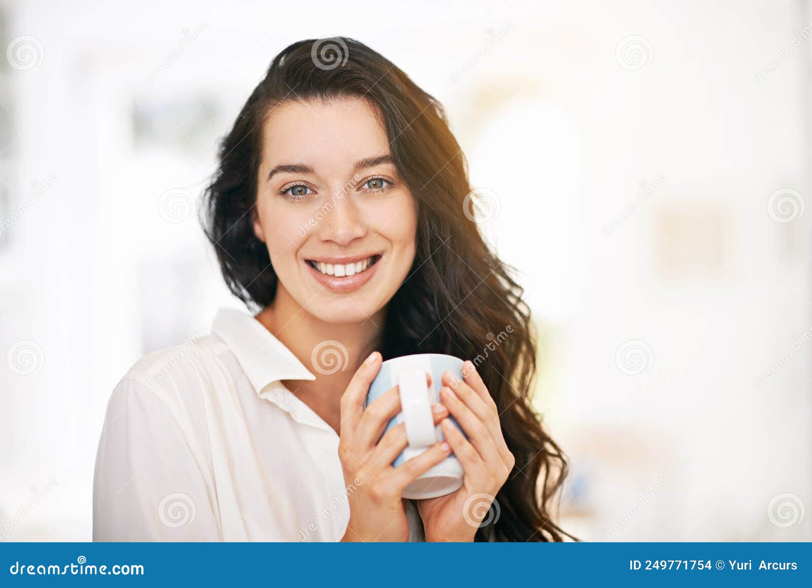 Enjoying a Cuppa Java Joy. Portrait of a Happy Young Woman Enjoying a Cup of Coffee. Stock Photo ...