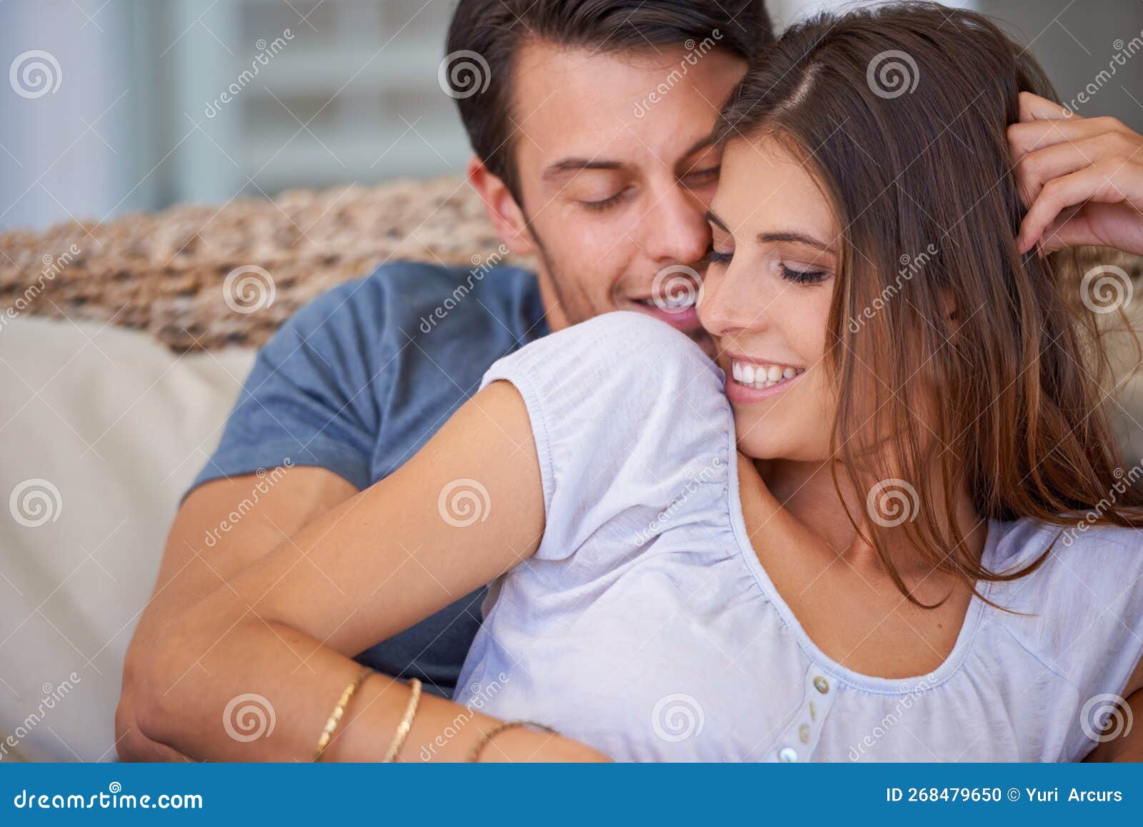 Enjoying Some Cuddles. a Loving Married Couple Cuddling and Being ...