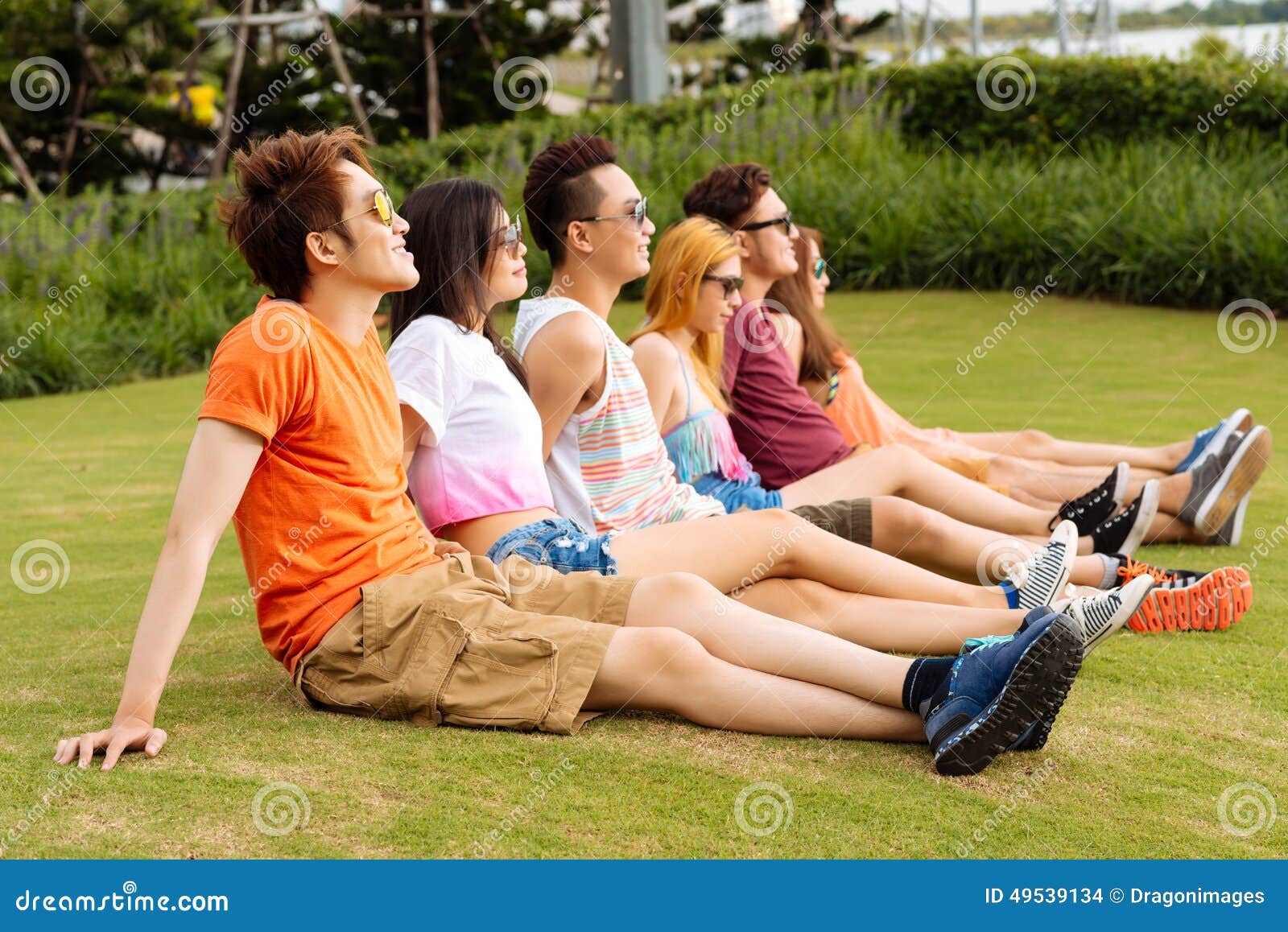 Enjoying the sunlight stock photo. Image of grass, people - 49539134
