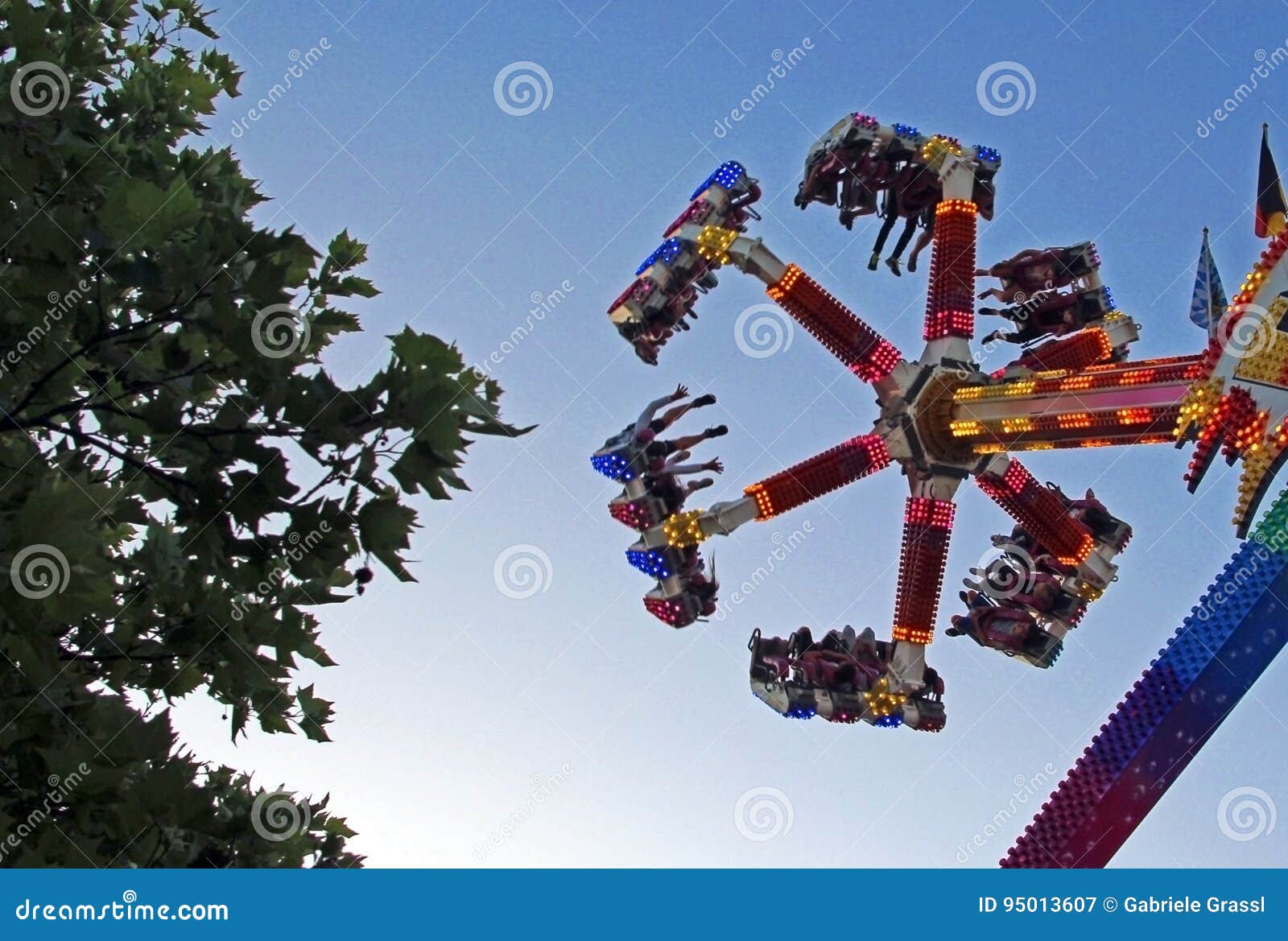 Enjoying a Thrill Ride in an Amusement Park Stock Image - Image of ...