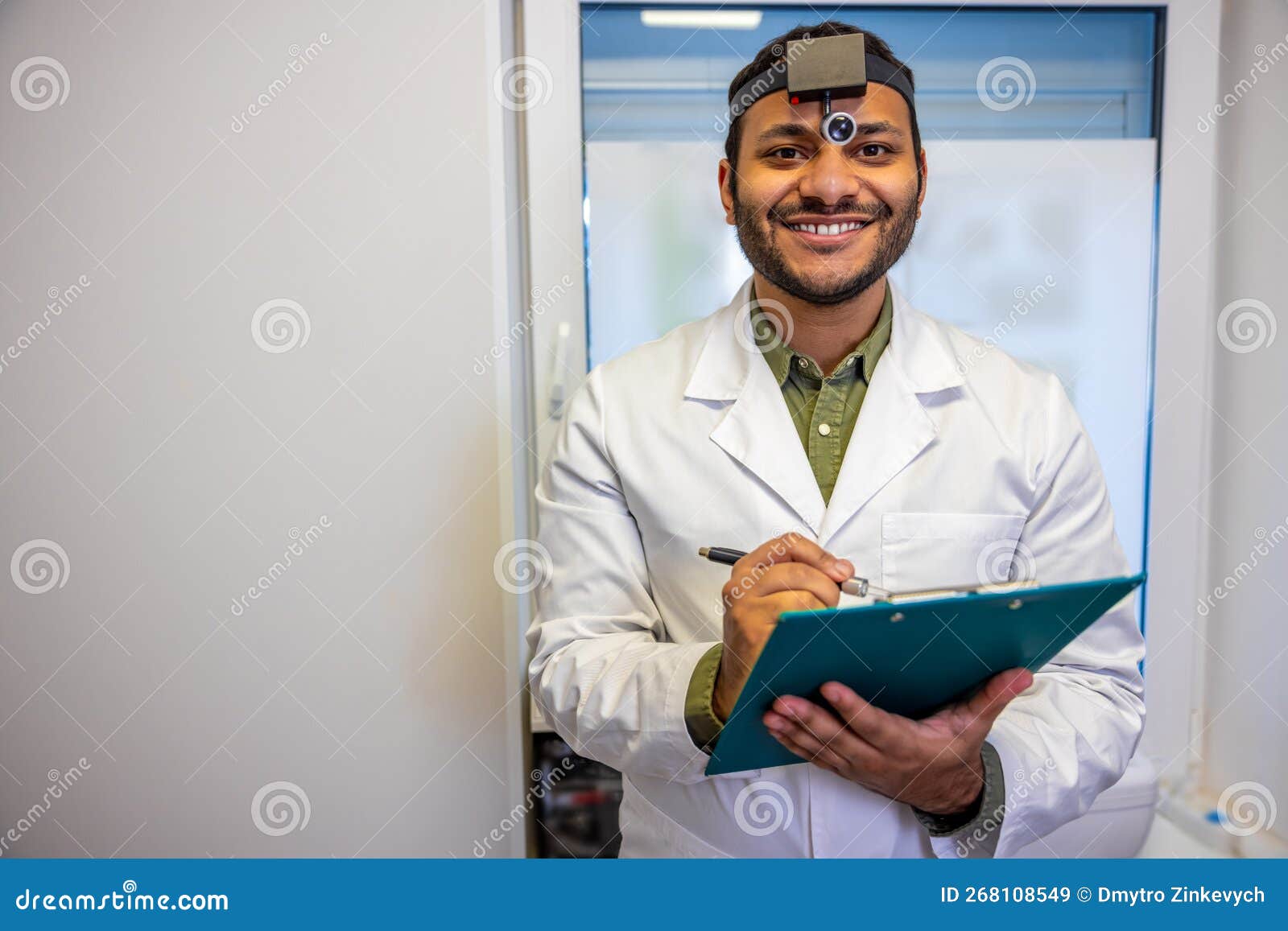 Ent Doctor Making Notes and Looking Contented Stock Image - Image of ...