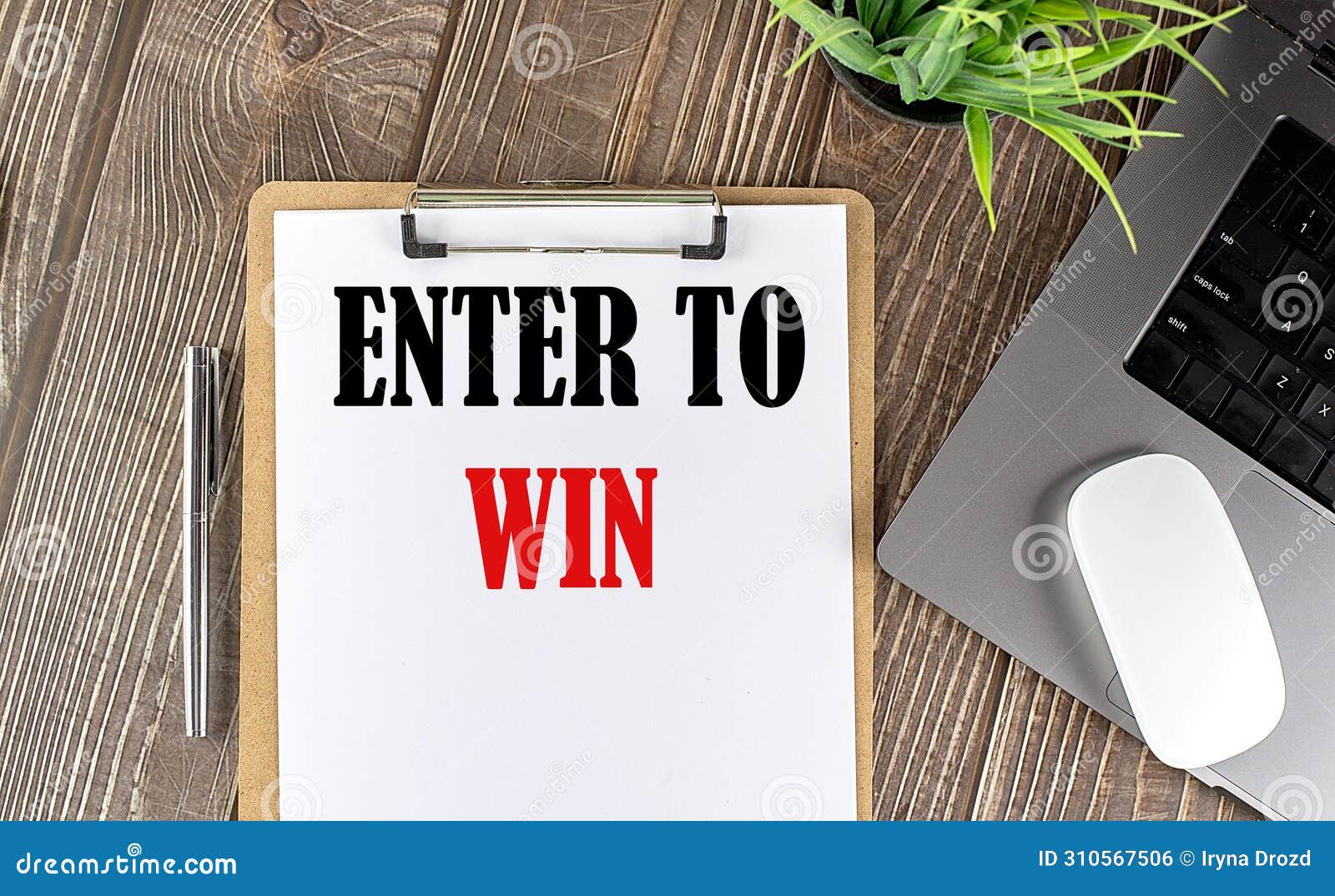 ENTER TO WIN Text on Clipboard Paper with Laptop, Mouse and Pen Stock ...