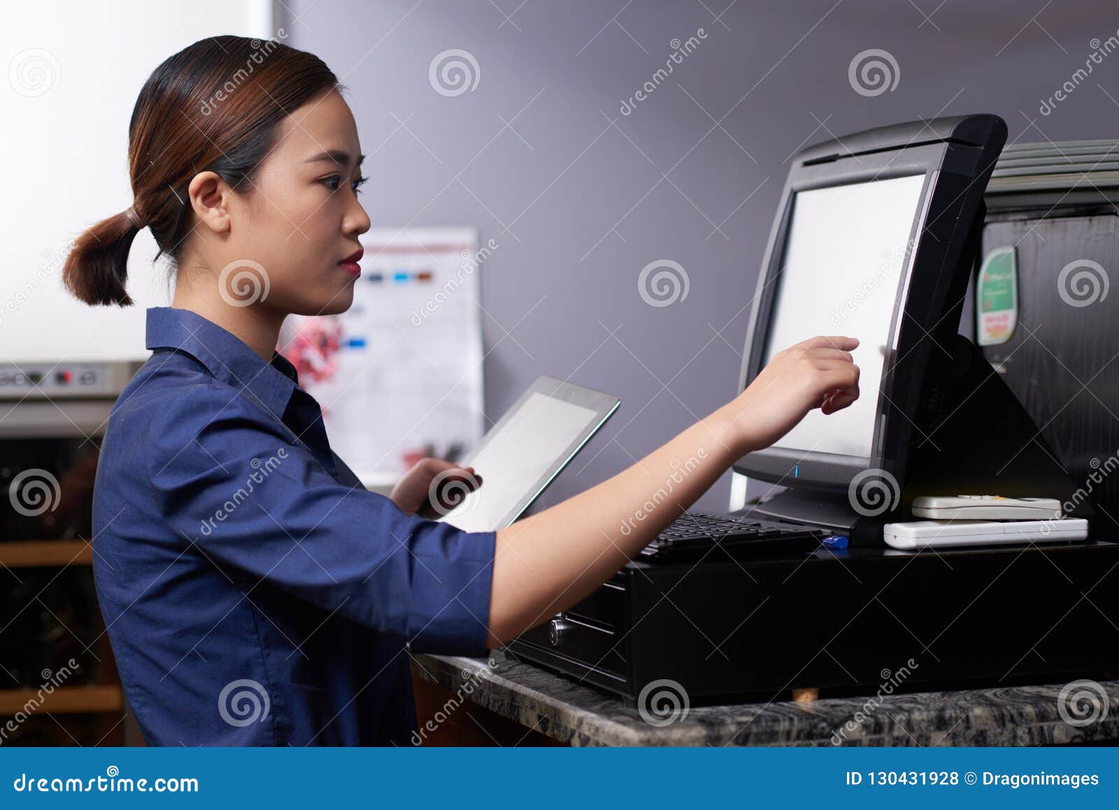 Entering order details stock photo. Image of employee - 130431928