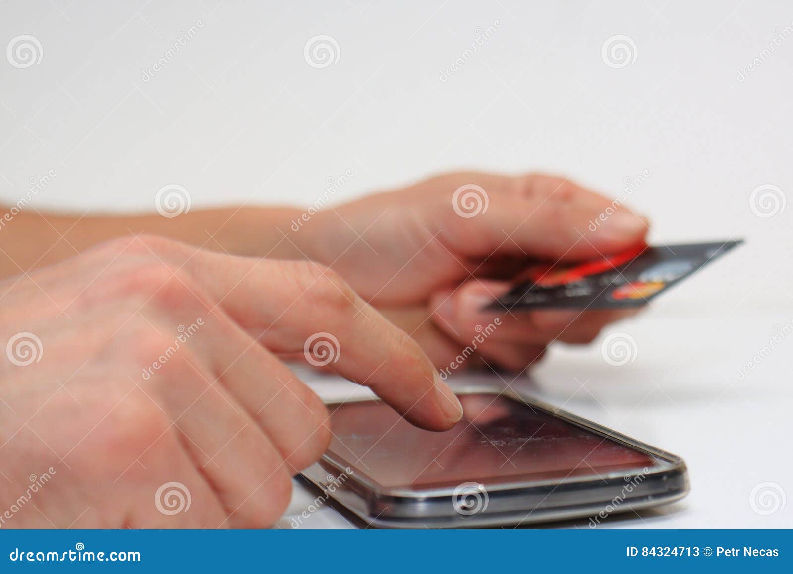 Entering Payments Online Using a Mobile Phone and Credit Card Editorial ...