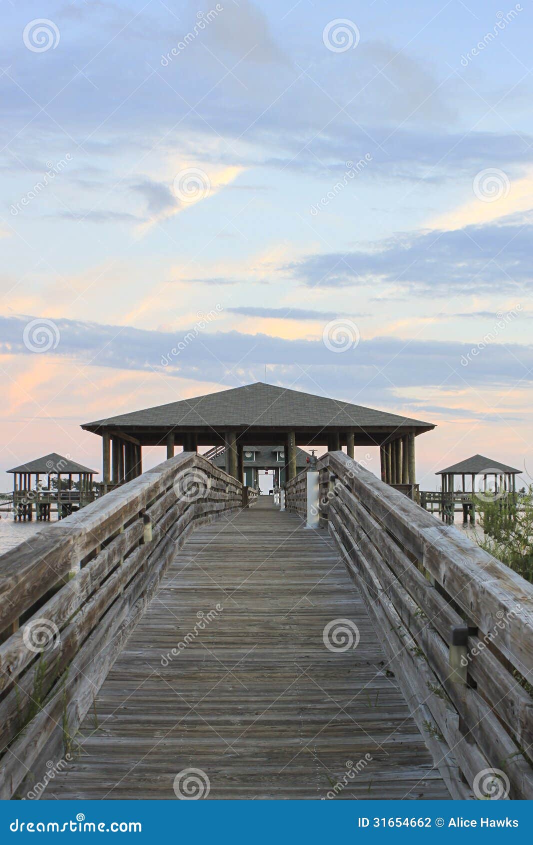 Entering the Pier stock photo. Image of dusk, space, copy - 31654662