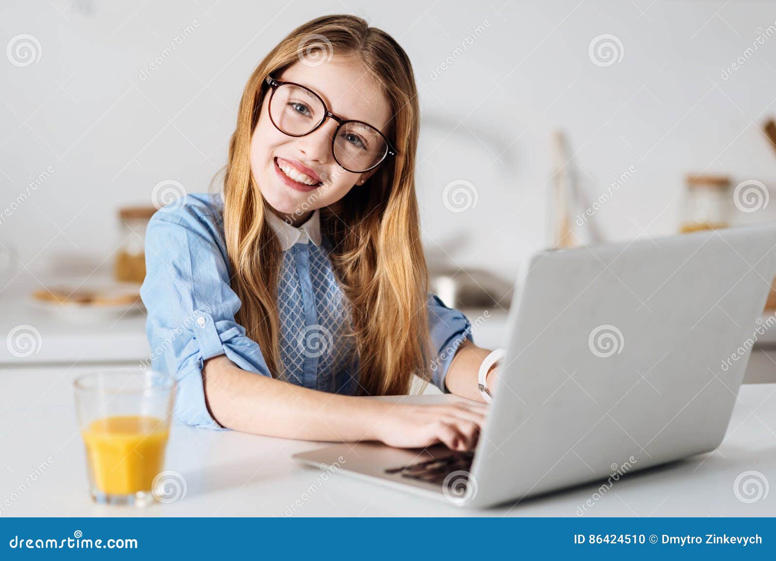 Enthusiastic Bright Girl Typing on Her Laptop Stock Photo - Image of ...