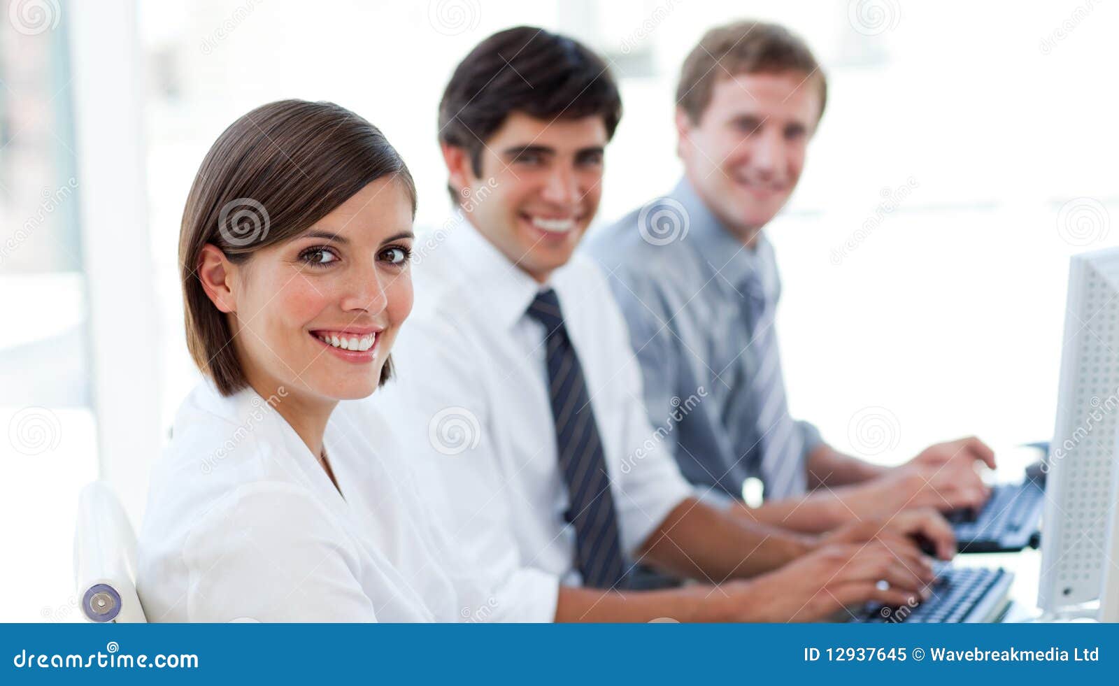 Enthusiastic Business People Working at Computers Stock Image - Image ...