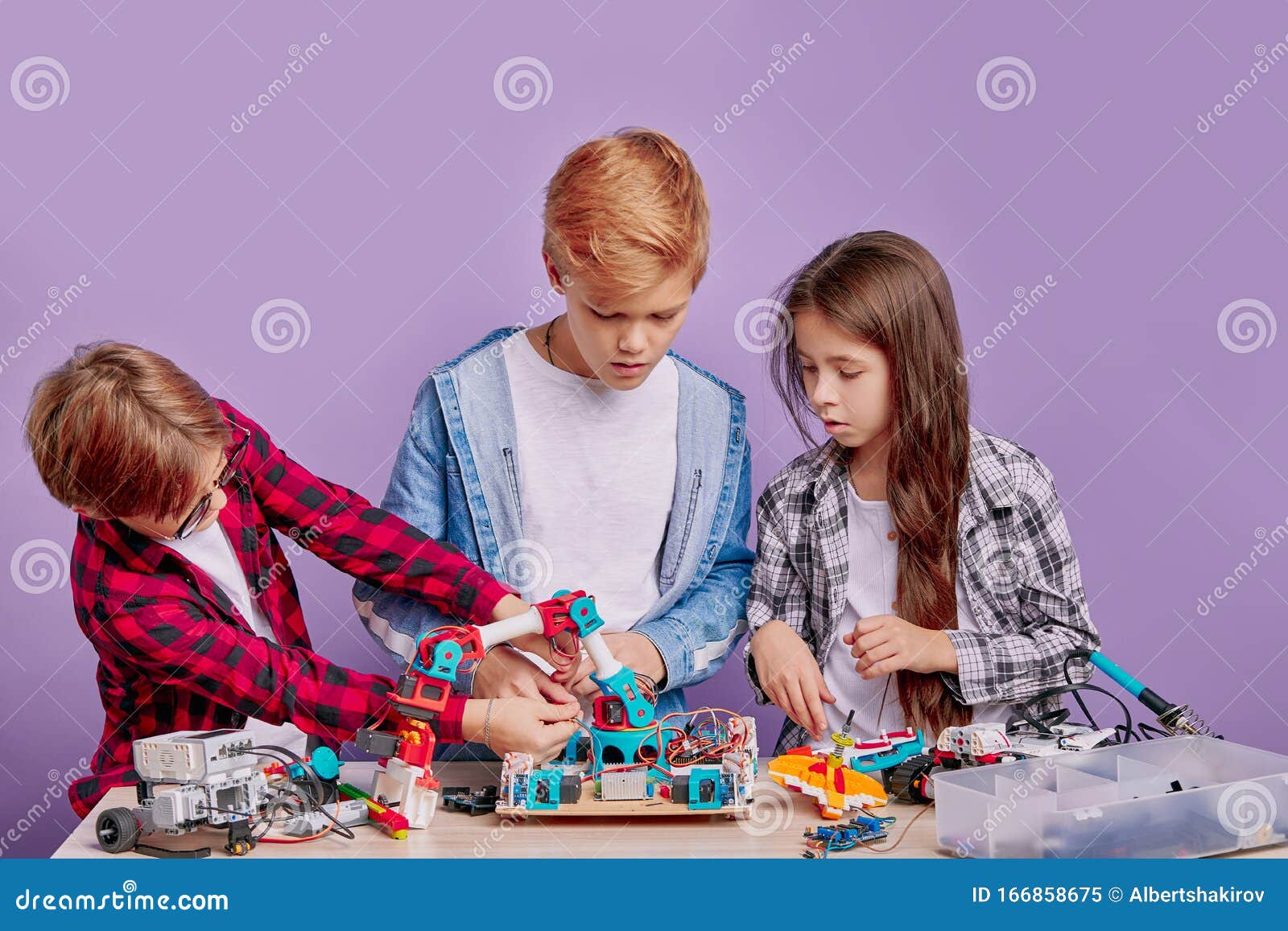 Enthusiastic Concerned Children Assembling Tech Robots, Future ...