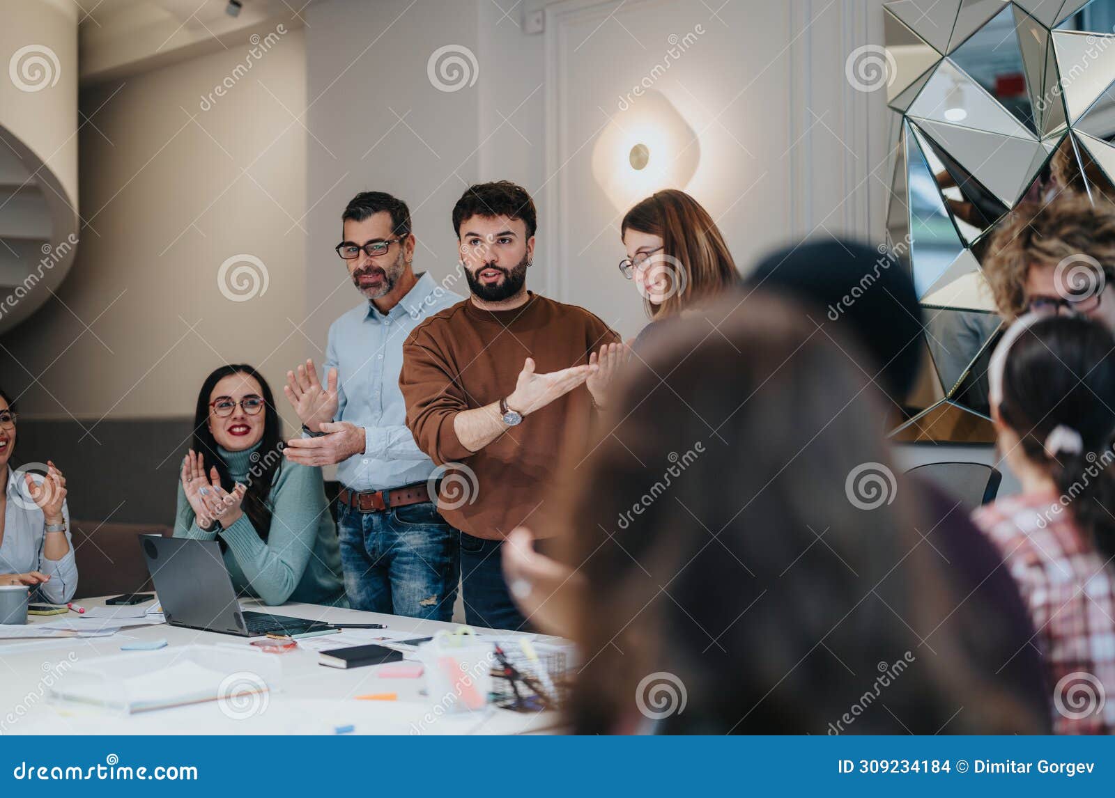 An Enthusiastic Group of Creative People Clapping for a Successful ...