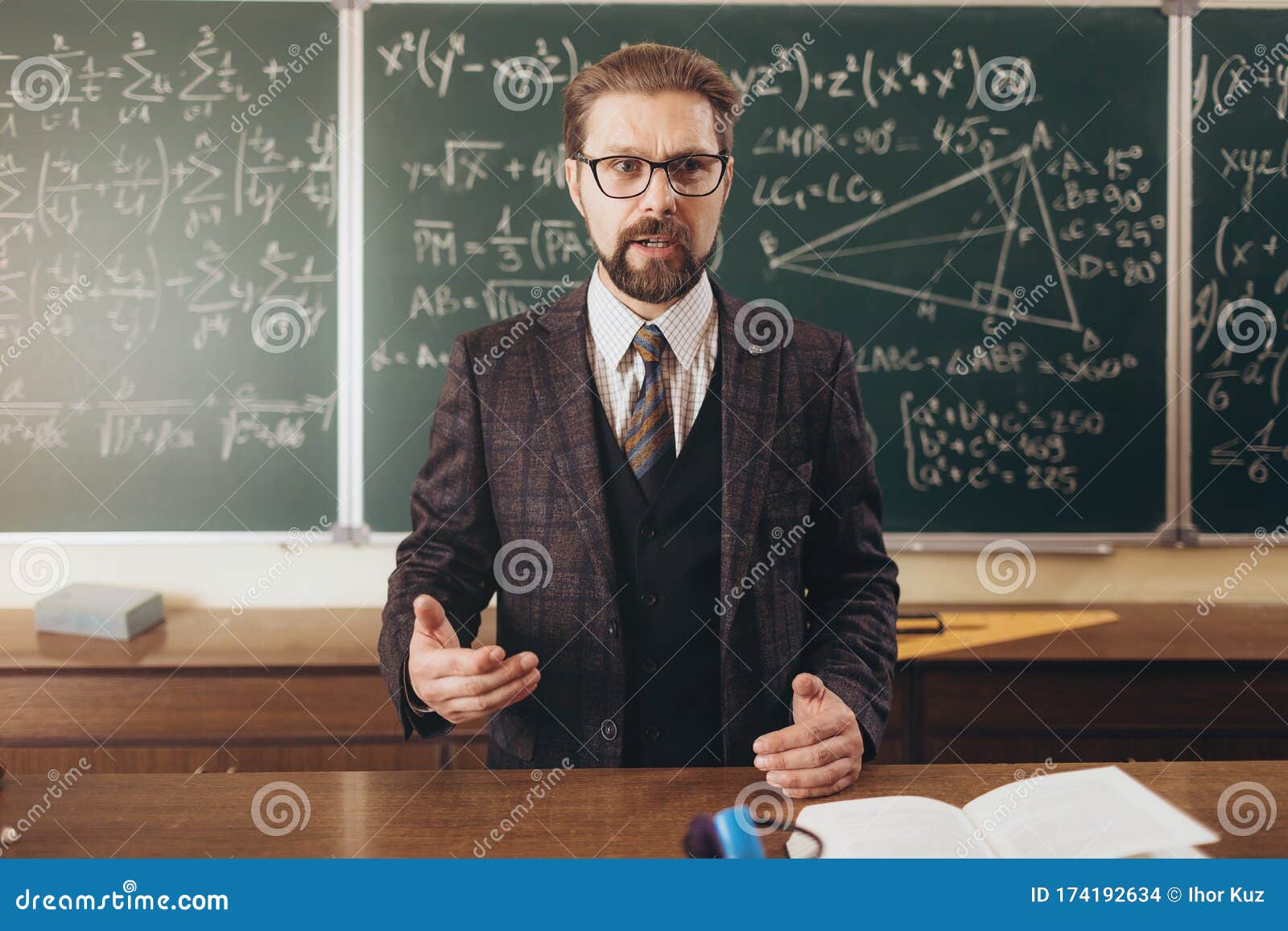 A Enthusiastic Professor Explaining a New Material Stock Photo - Image ...