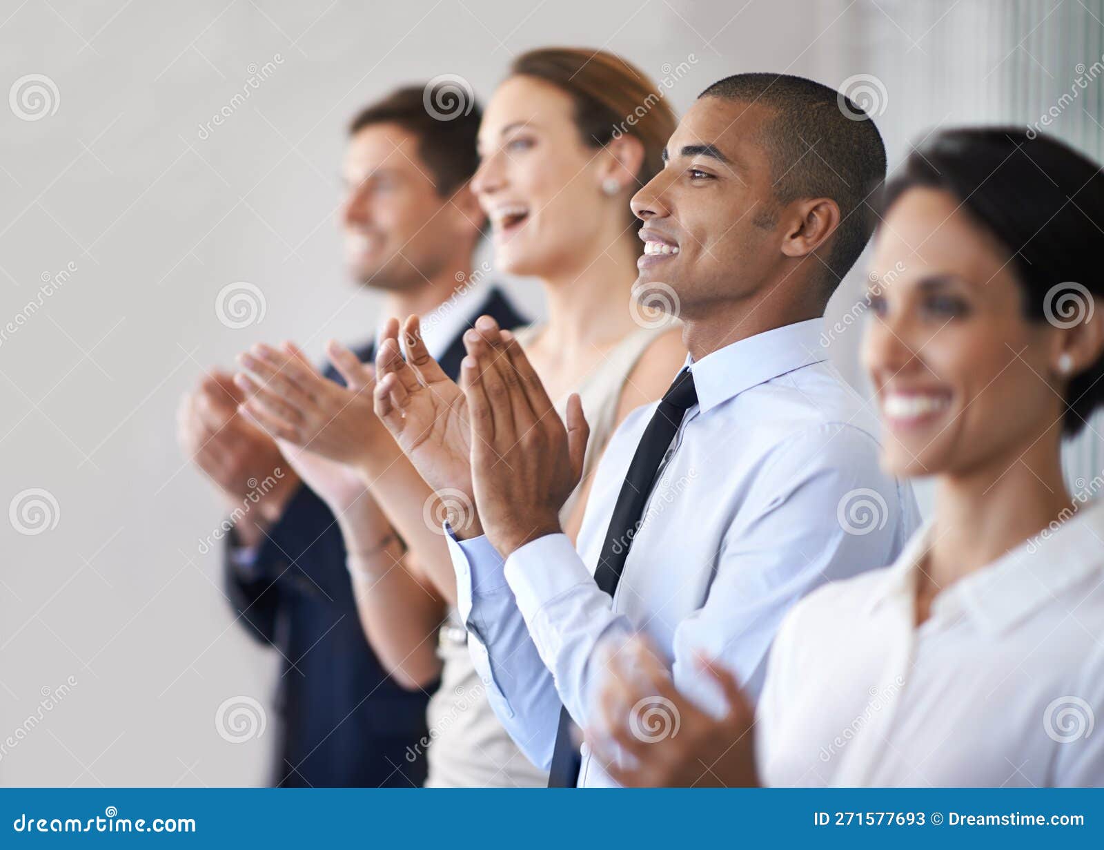 An Enthusiastic Round of Applause. a Row of Businesspeople Clapping ...