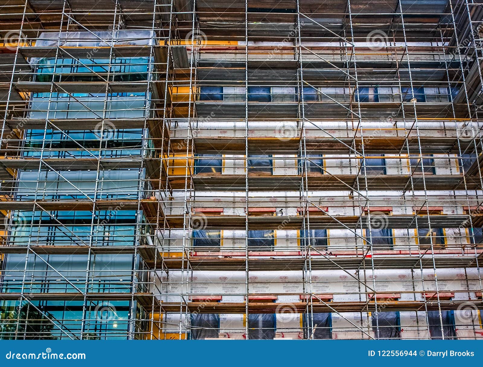 Scaffolds Up the Building stock photo. Image of heavy - 122556944