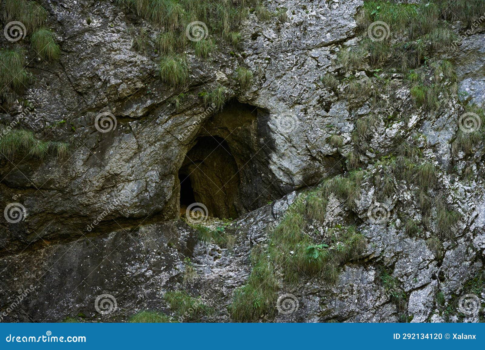 Entrance of a Cave in the Mountains Stock Photo - Image of dark ...